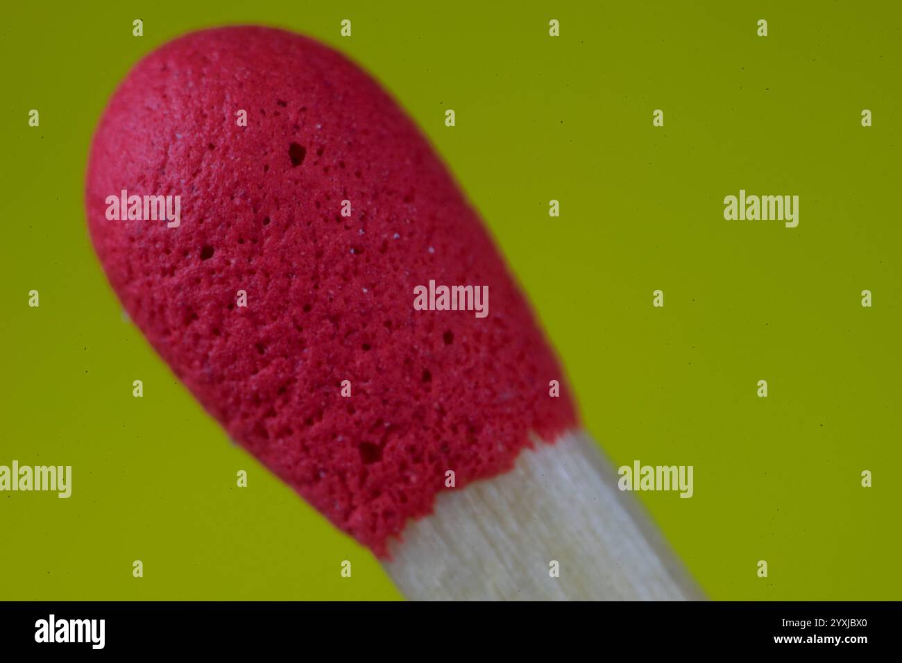 Macrophotography of phosphorus head made of flammable red material ...