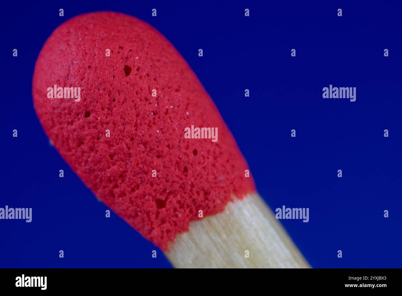 Macrophotography of phosphorus head made of flammable red material ...