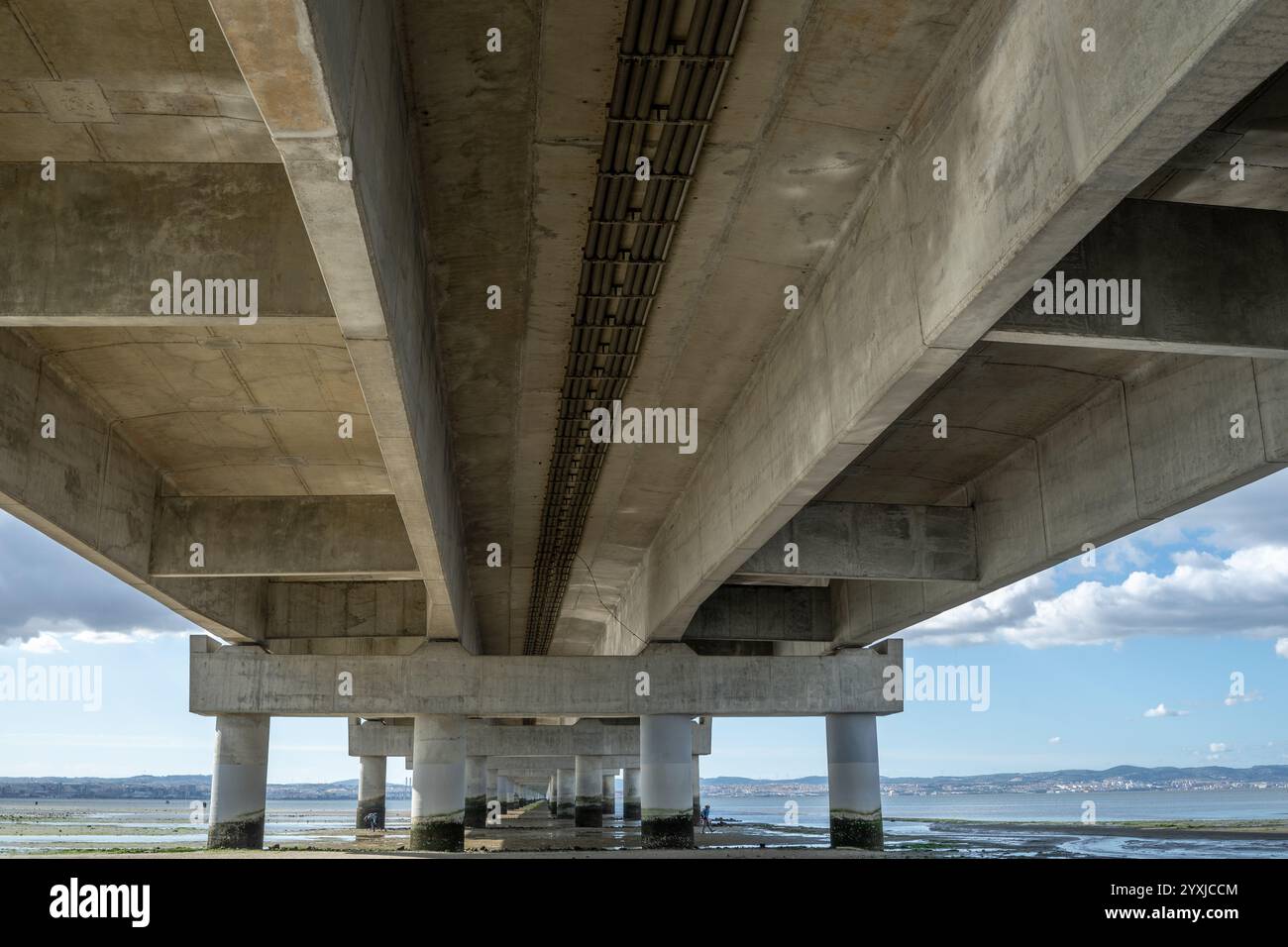 Part under the Vasco da Gama bridge in perspective of infinity with the ...
