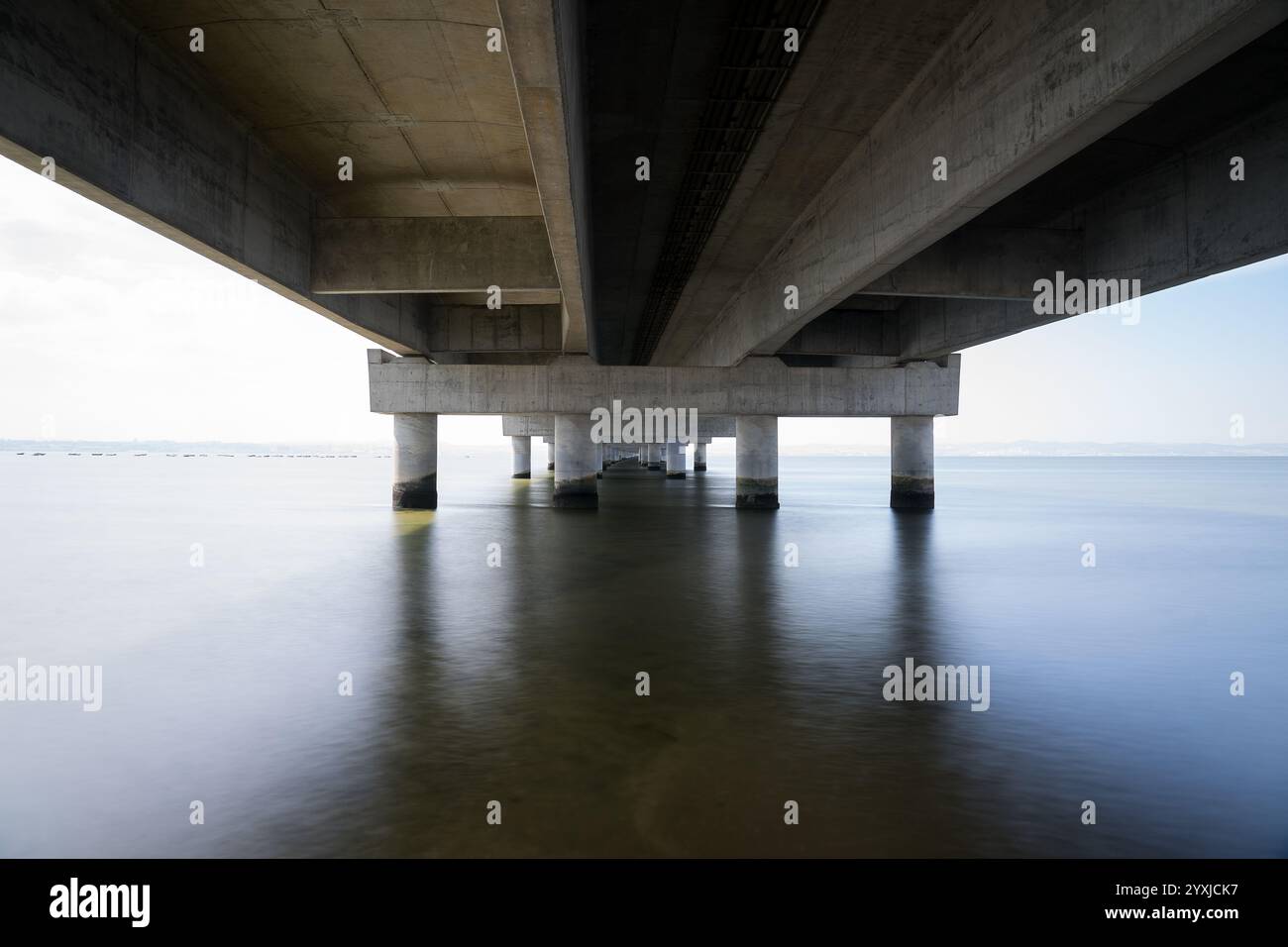 Part under the Vasco da Gama bridge in perspective of infinity with the ...
