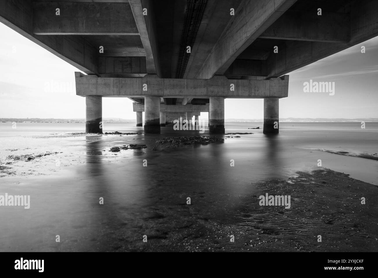 Part under the Vasco da Gama bridge in perspective of infinity with the ...