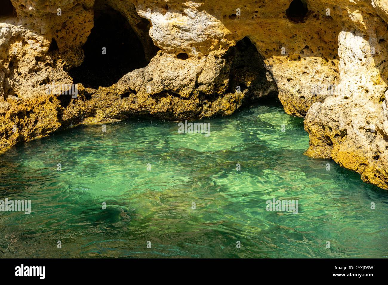 Cove with crystal clear water in the doll s cave in dry algar in ...