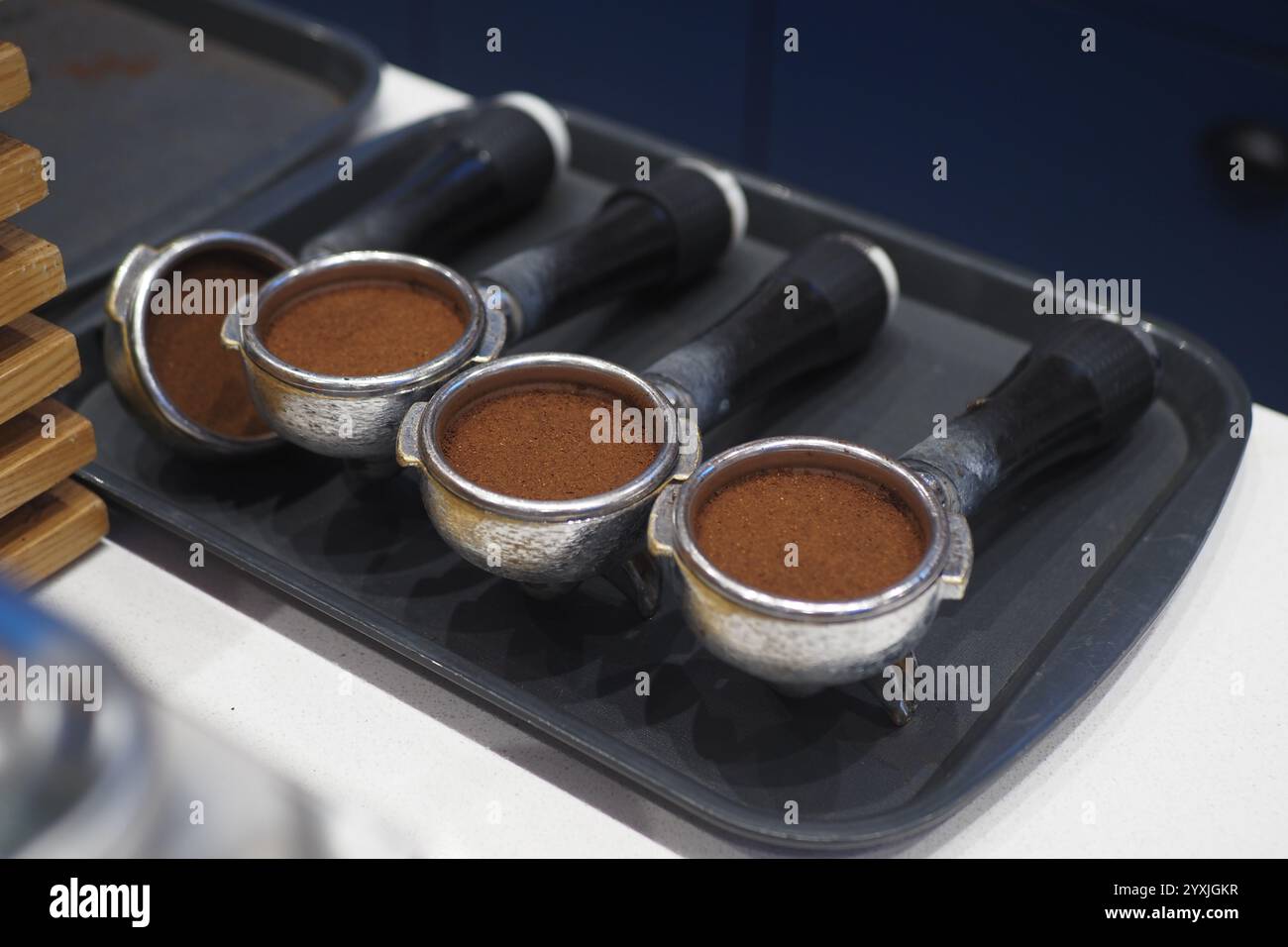 Four Coffee Portafilters Are Prepared and Ready for Brewing a Perfect ...
