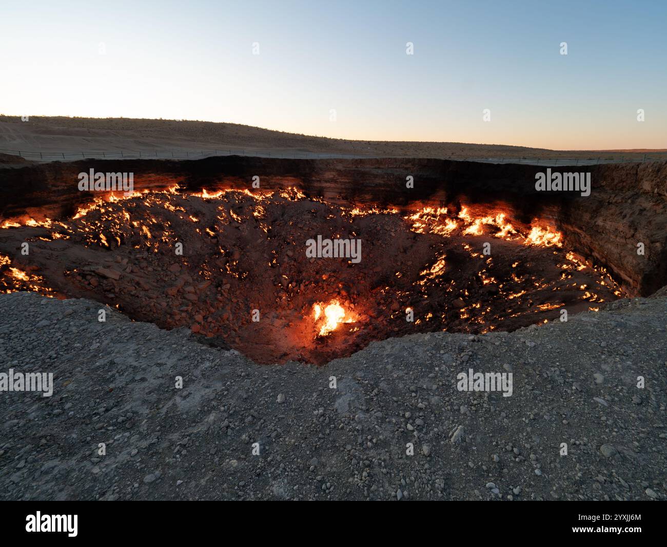 The Darvaza Gas Crater or the Door to Hell is a natural gas field that ...