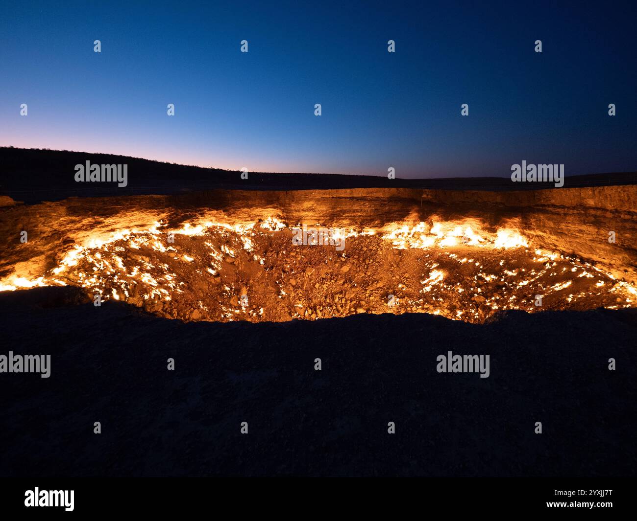 The Darvaza Gas Crater or the Door to Hell, a burning natural gas field ...