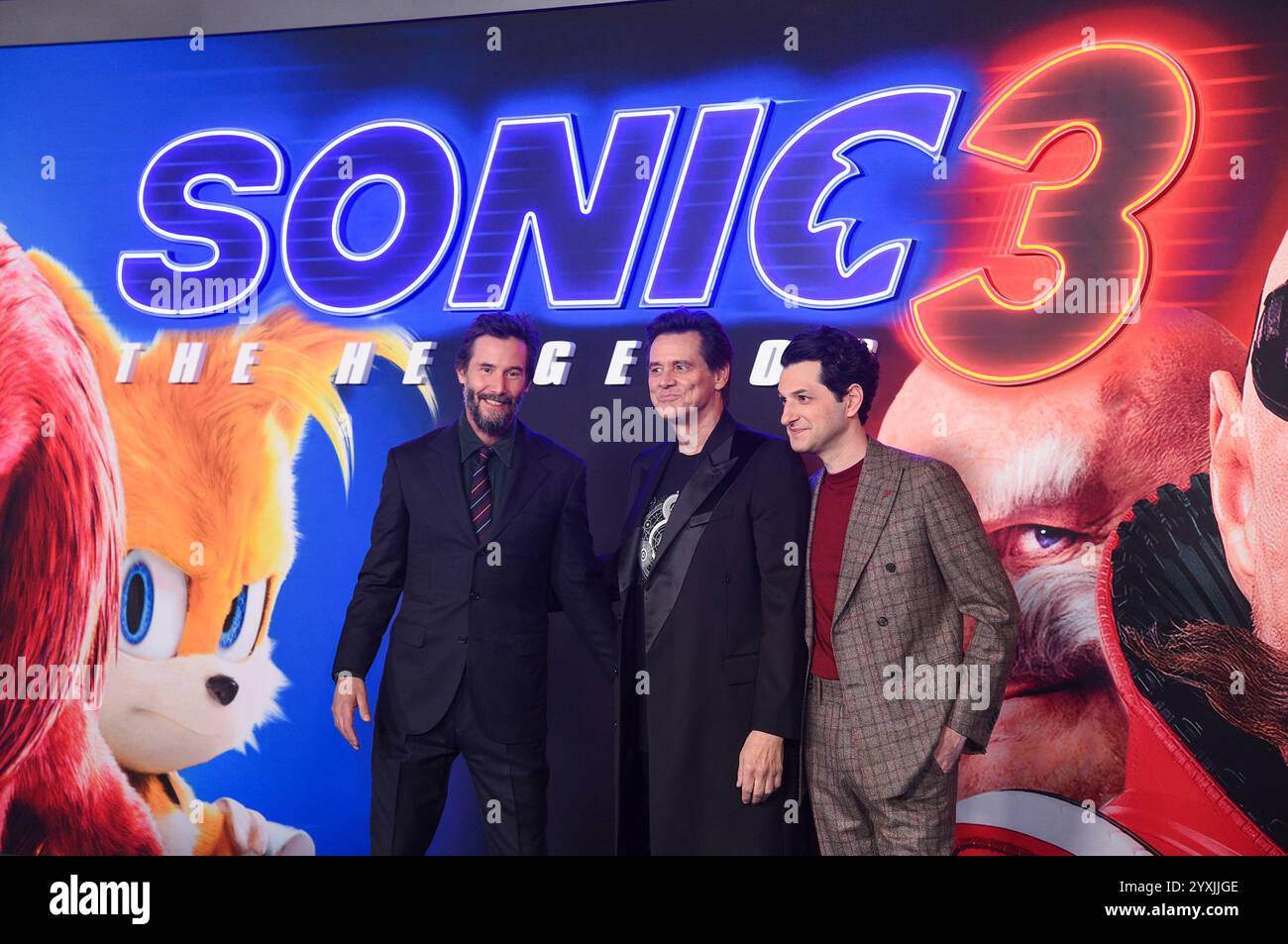 Keanu Reeves, from left, Jim Carrey, and Ben Shwartz arrive at the ...