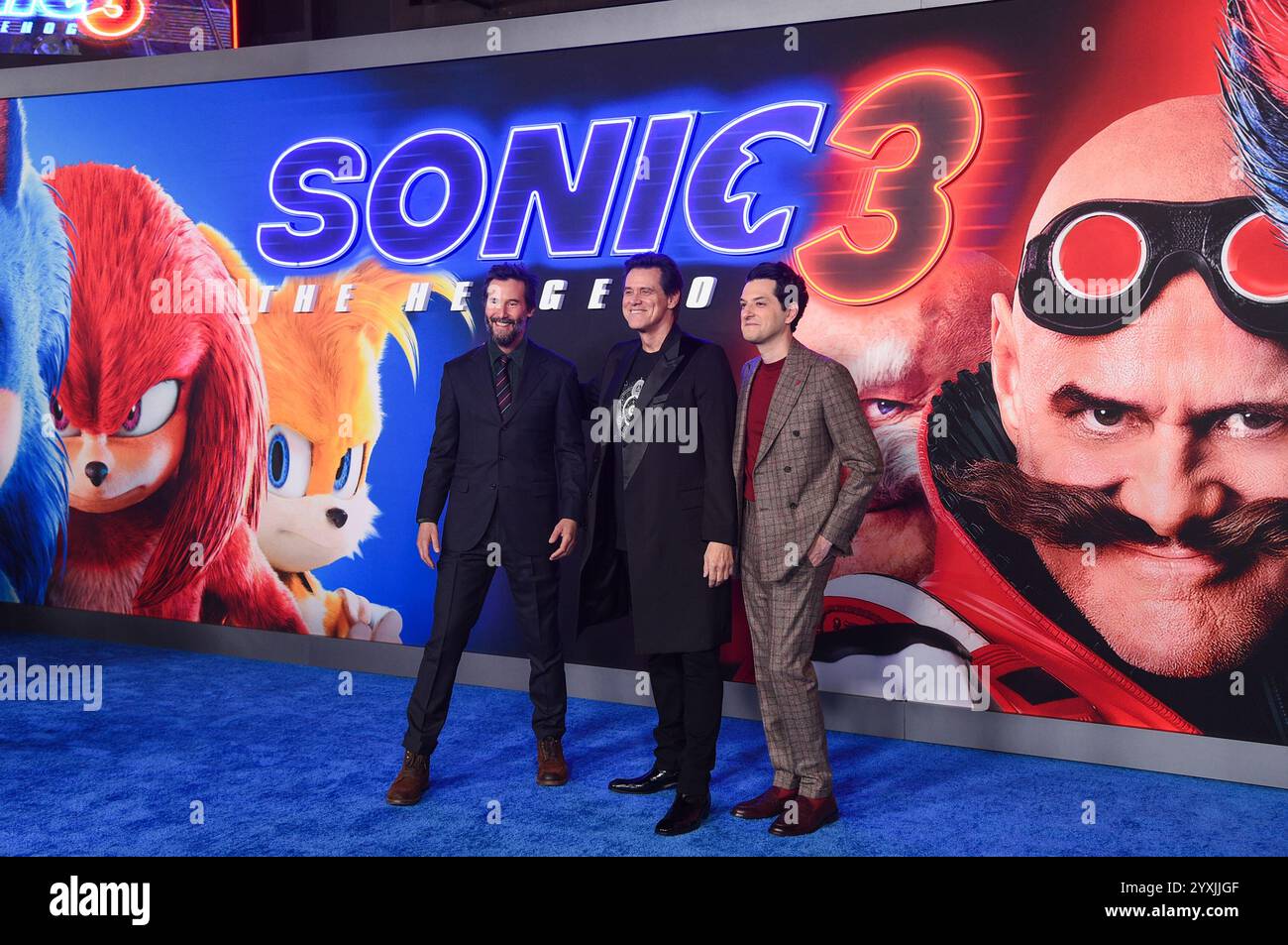 Keanu Reeves, from left, Jim Carrey, and Ben Shwartz arrive at the ...