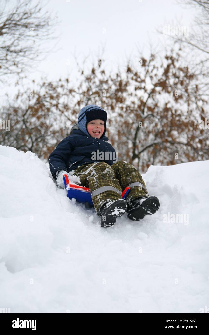 Child enjoy rides hi-res stock photography and images - Alamy
