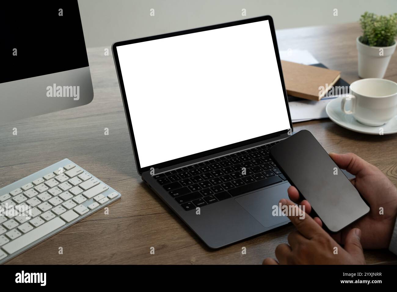 mock up Using laptop with blank screen computer modern Stock Photo - Alamy