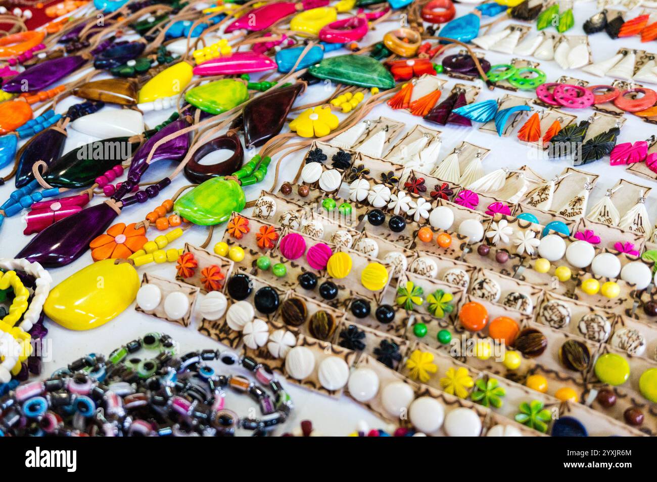 A table full of colorful beads and beads of different shapes and sizes ...