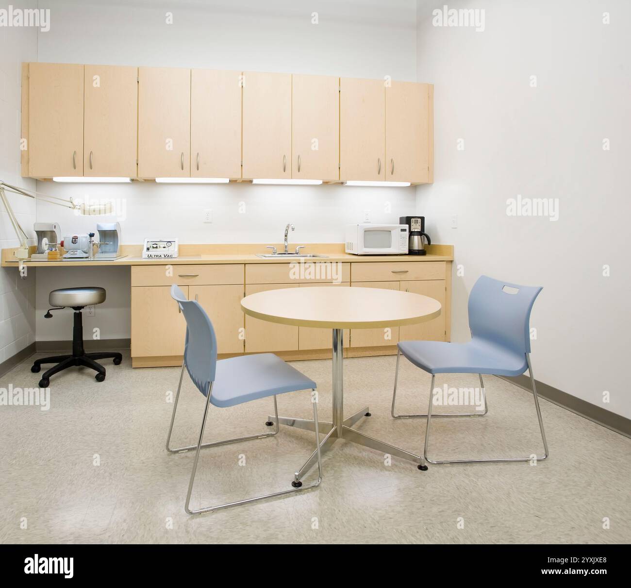 Employee break room with work space Stock Photo - Alamy