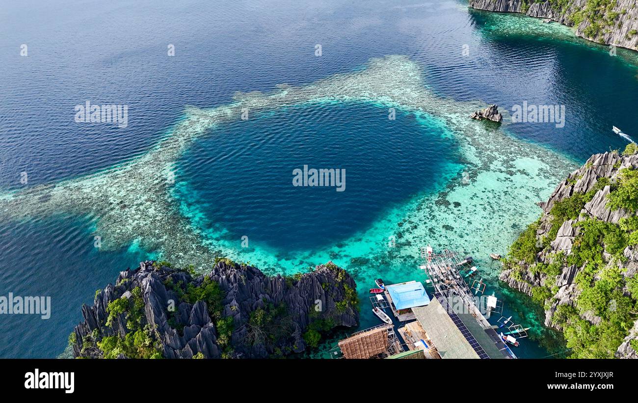 An incredible aerial view of a pristine coral lagoon with vibrant ...