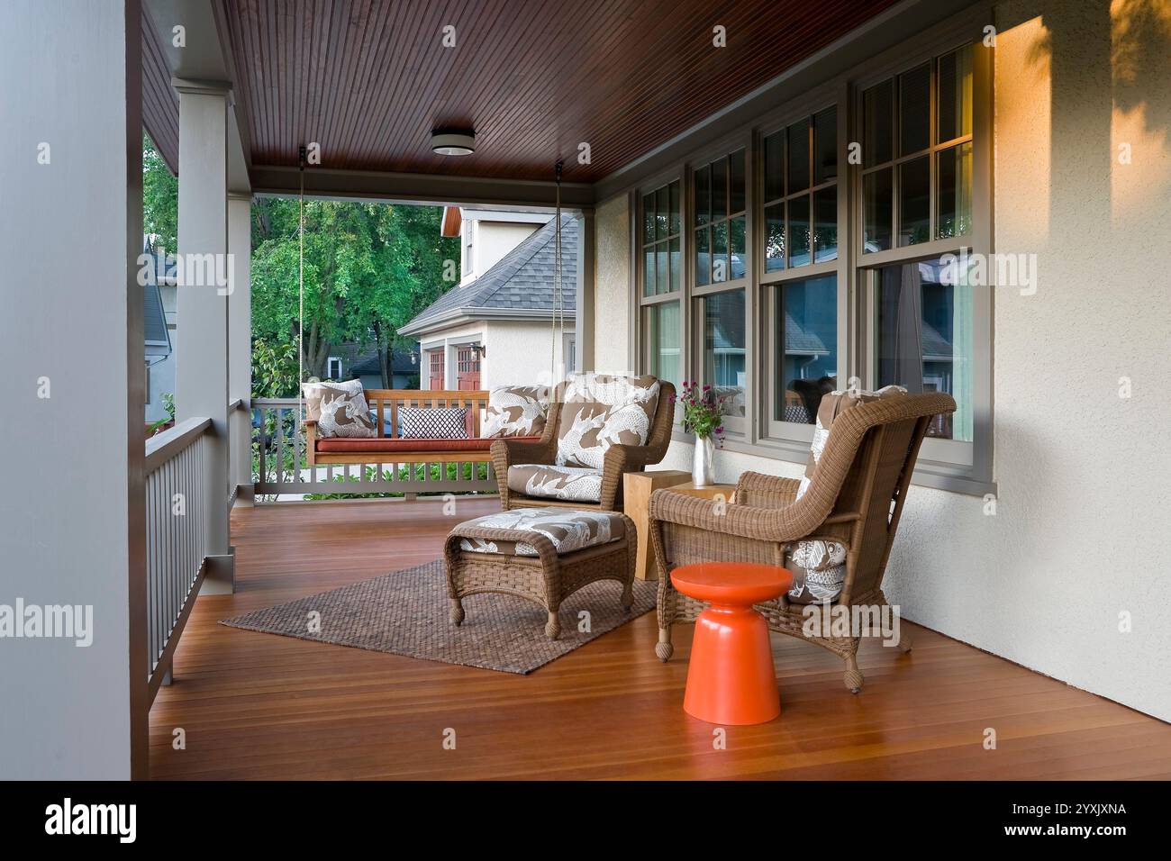 Front porch of house showing outdoor furniture, porch swing and view ...