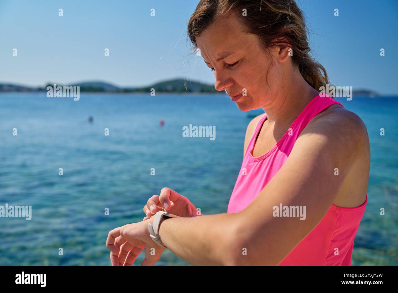 Female runner jogging on sea hi-res stock photography and images - Alamy