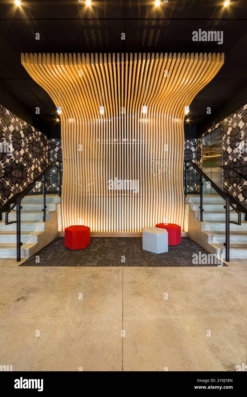 Entrance lobby of new apartment building with unique laser cut wood ...