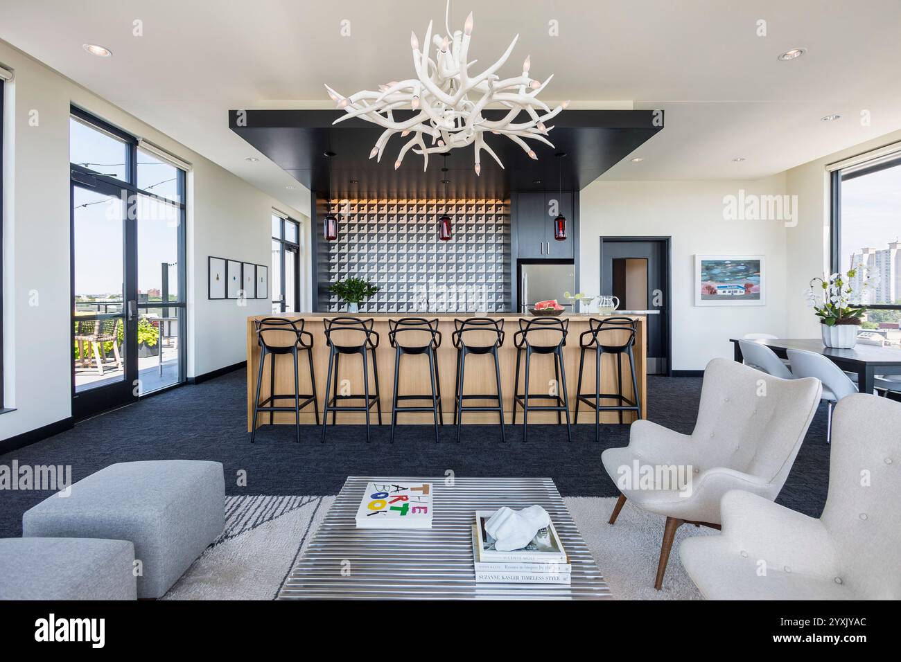 Upper floor lounge in new apartment building Stock Photo - Alamy