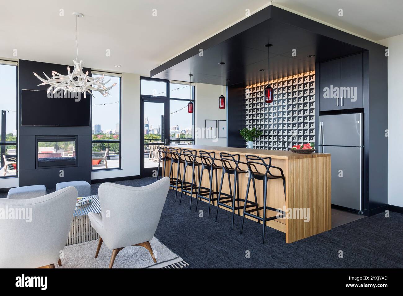 Black soffit and wall enclosure delineates kitchen area hi-res stock ...