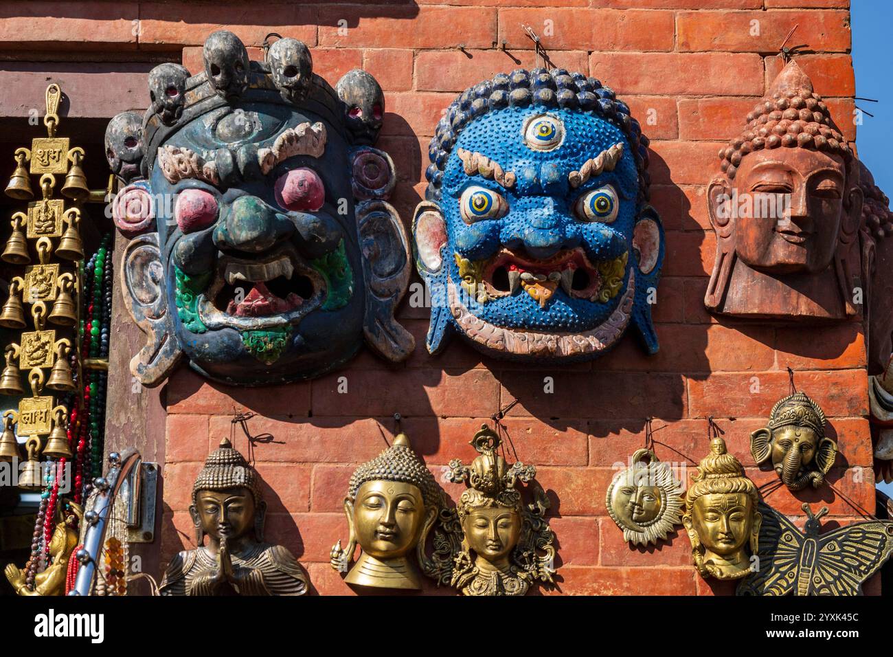 Traditional wooden masks on sale at souvenir shop at Swayambhunath ...