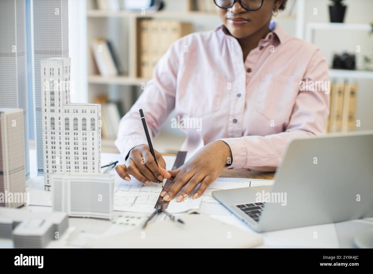 African Woman Architect Focused On Drawing City Blueprint With Scale Models Professional