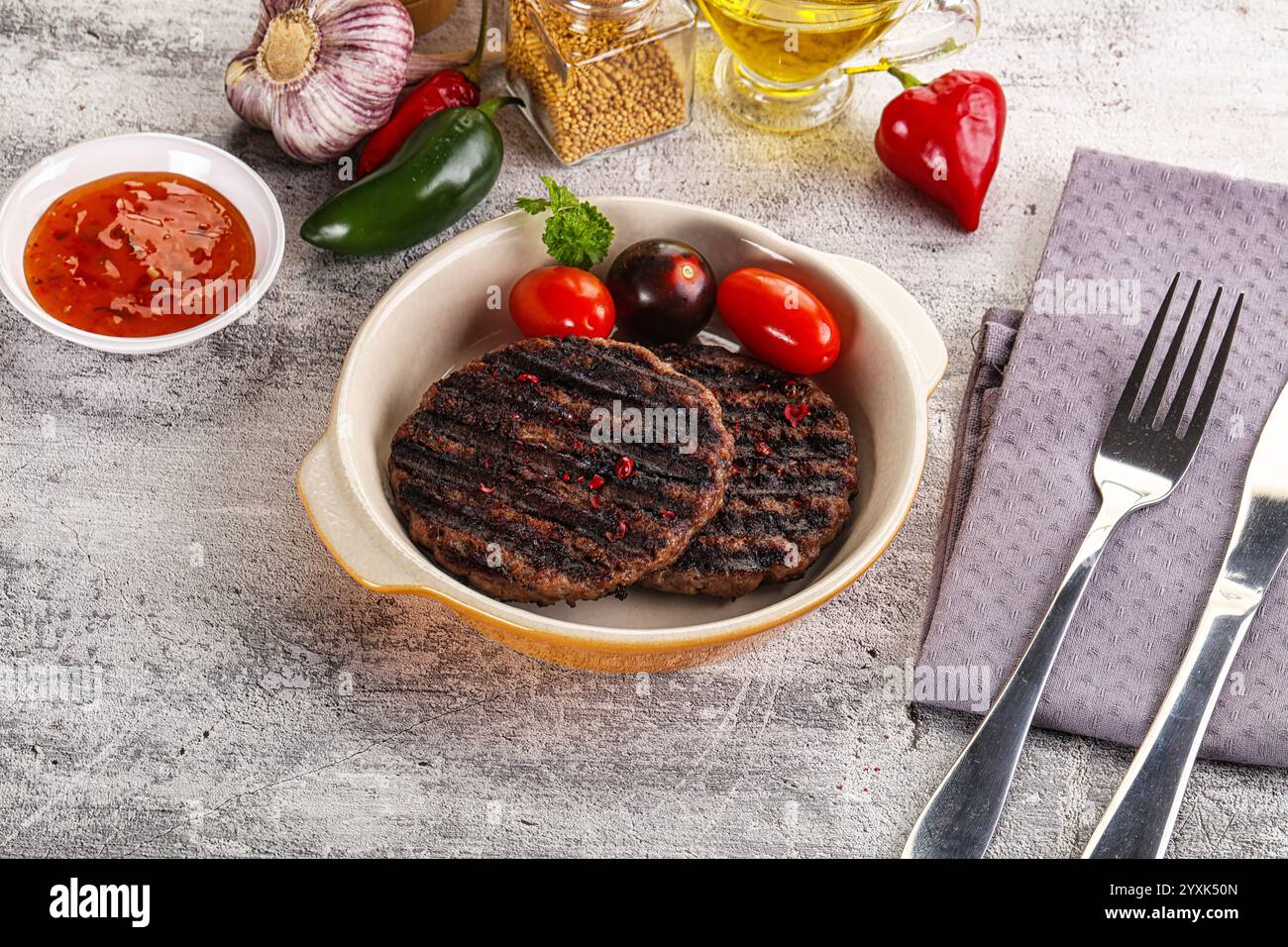Grilled beef burger cutlet with sauce Stock Photo - Alamy