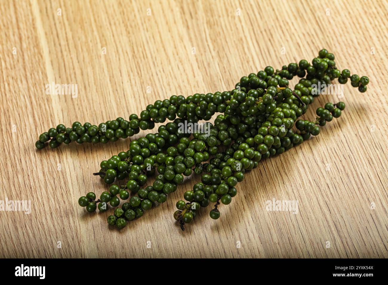 Fresh ripe green peppercon heap isolated Stock Photo - Alamy