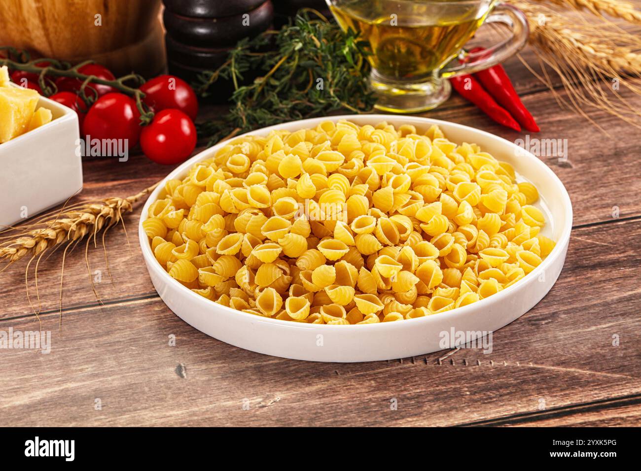 Italian cuisine - dry conchiglie shell pasta Stock Photo - Alamy