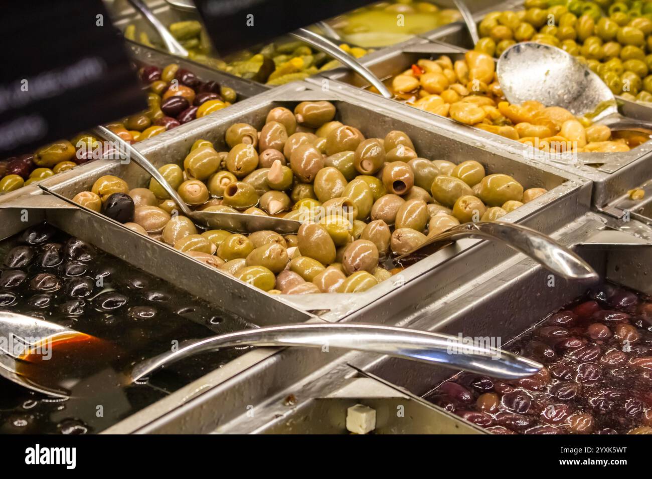 A view of an olive bar, seen at a local grocery store Stock Photo - Alamy