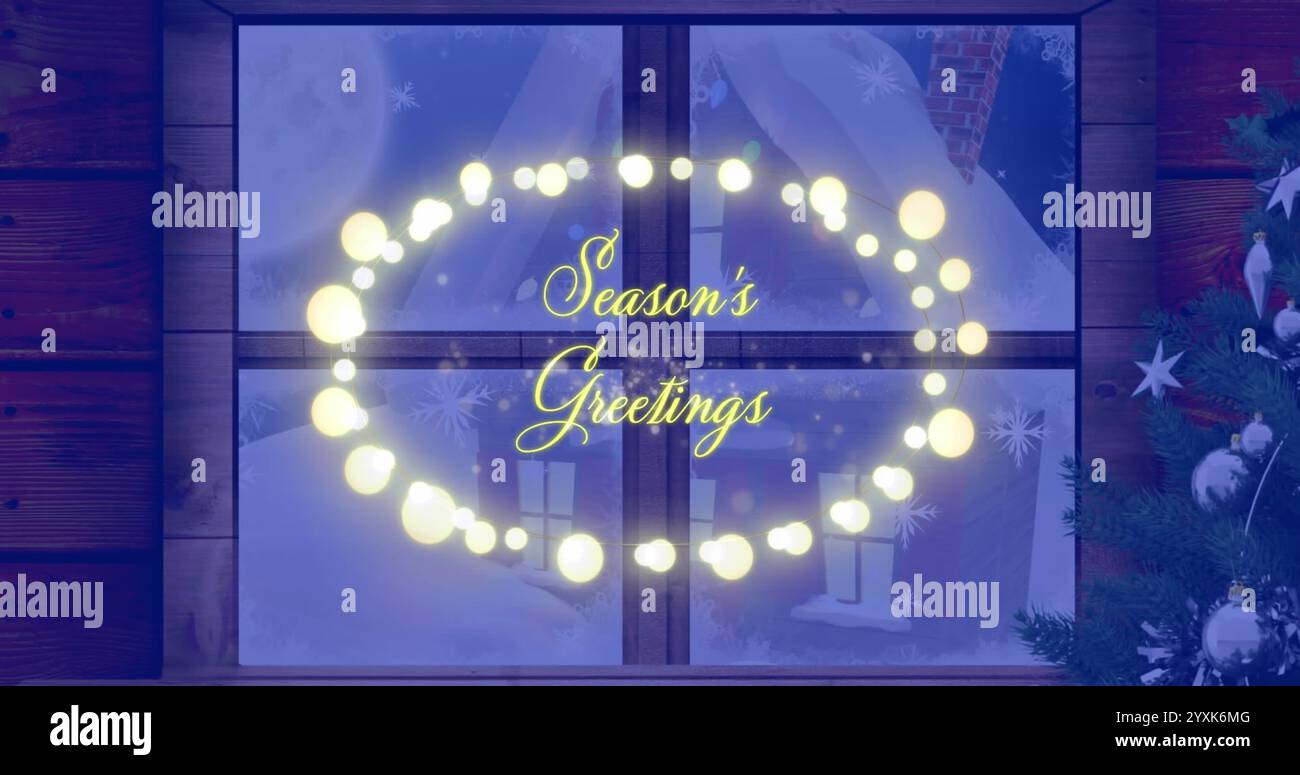 Image of seasons greetings text on fairylights banner over view of ...