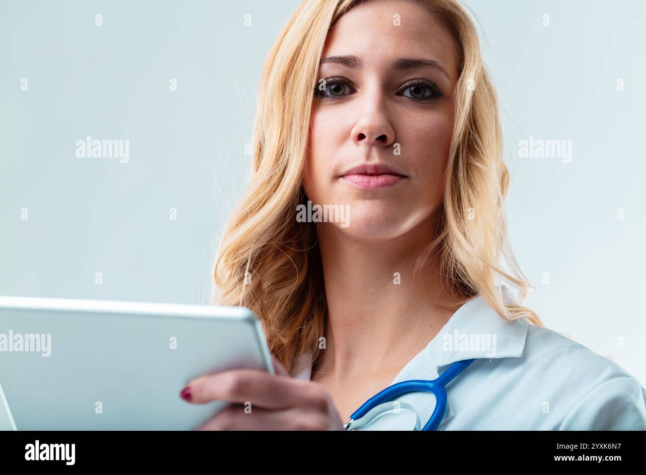 In copyspace, doctor uses mobile device for telemedicine, efficient ...