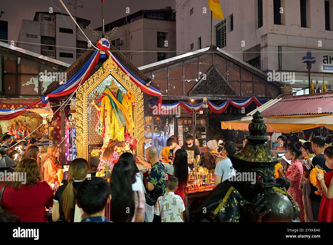 The highly revered Ganesha shrine at Huai Khwang junction in Bangkok ...