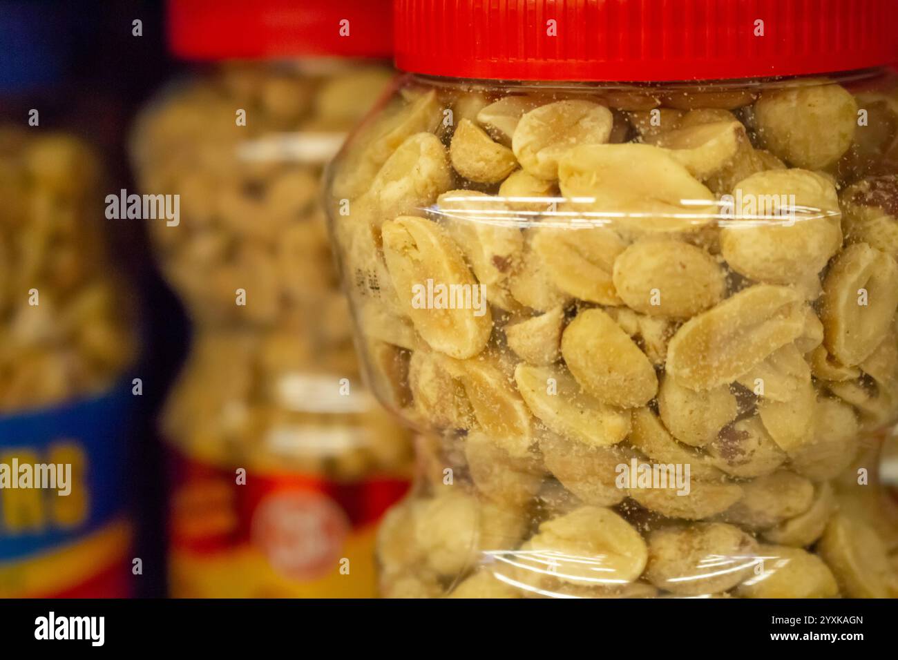 A closeup view of peanuts in a jar Stock Photo - Alamy