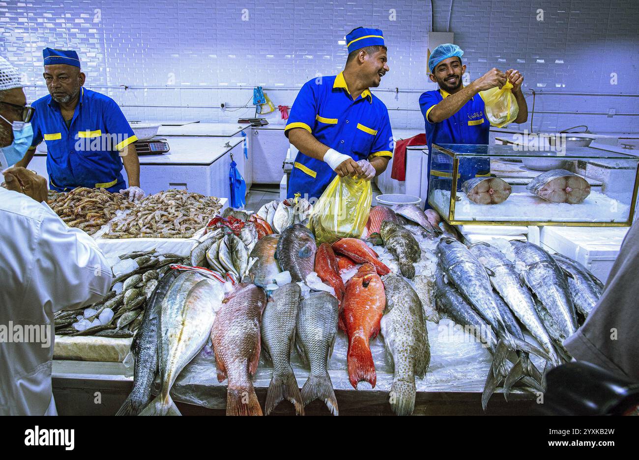 Saudi Arabia, Jeddah, 21-11-2024, vendors at a fish stand, guest ...