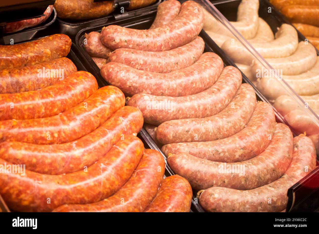 A view of some sausage in a display case at the grocery store Stock ...