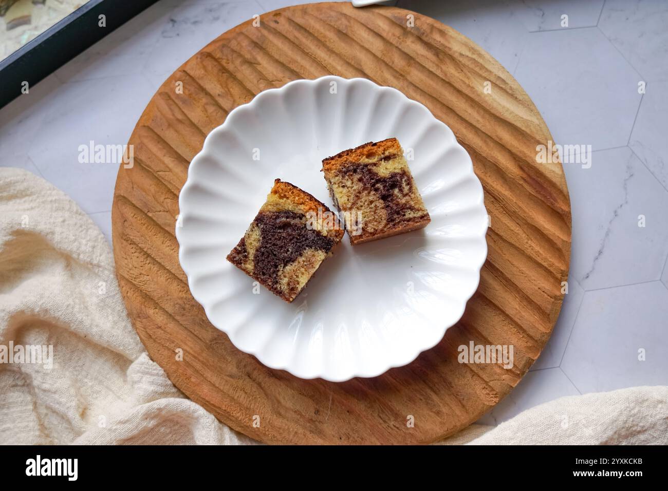 Homemade Marble Cake Squares on a Wooden Tray With Tea Setup Floral ...