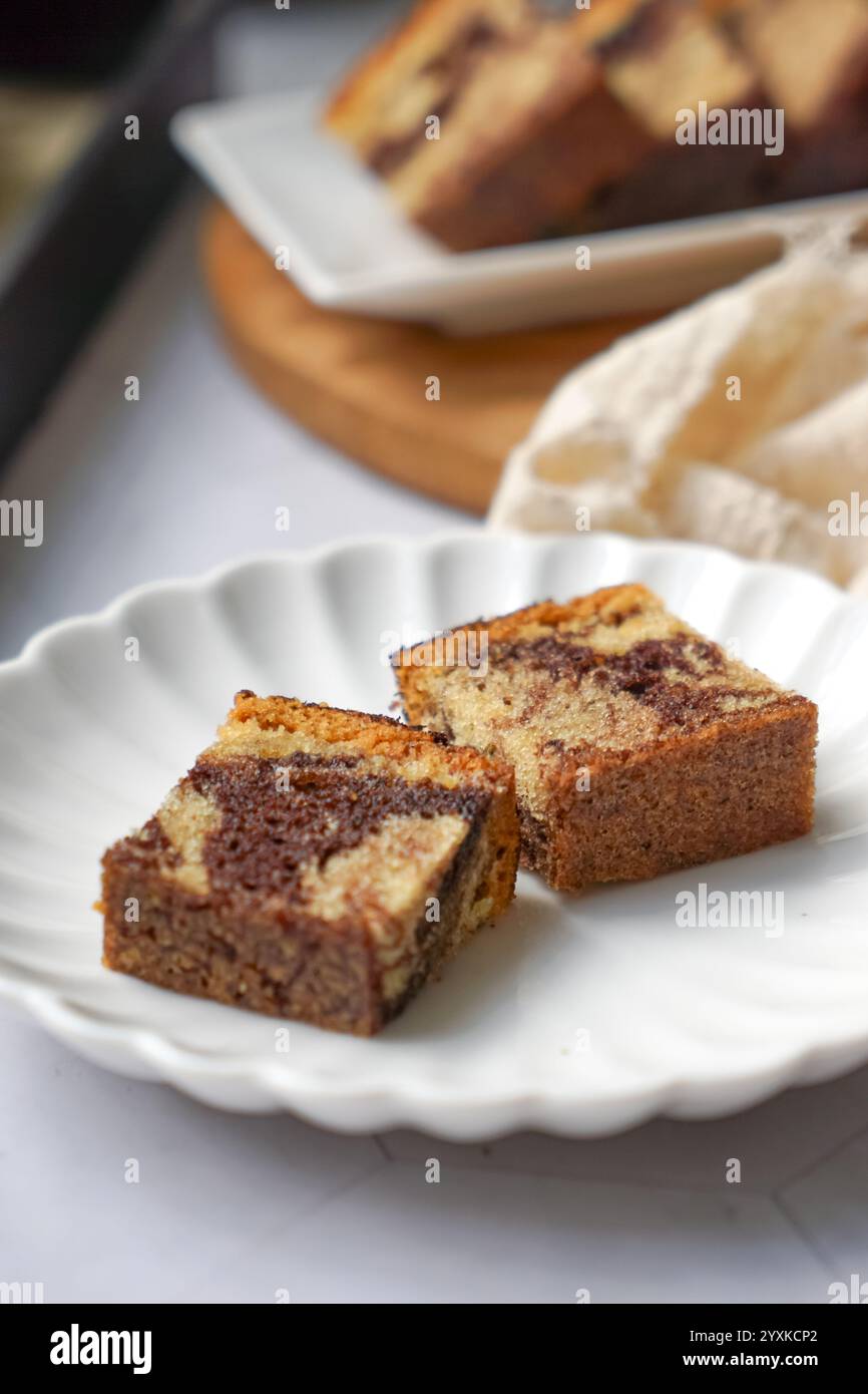 Homemade Marble Cake Squares on a Wooden Tray With Tea Setup Floral ...