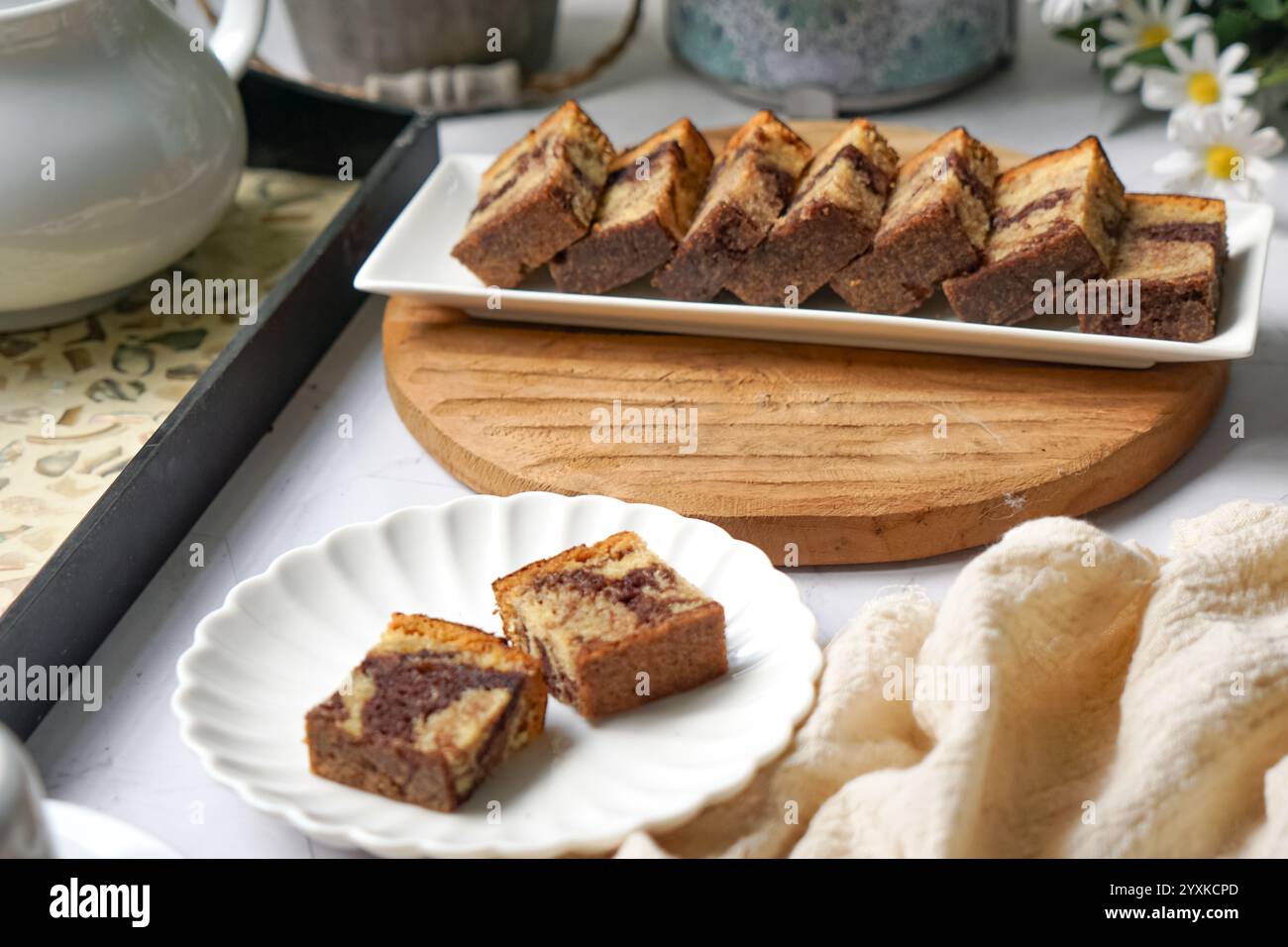 Homemade Marble Cake Squares on a Wooden Tray With Tea Setup Floral ...