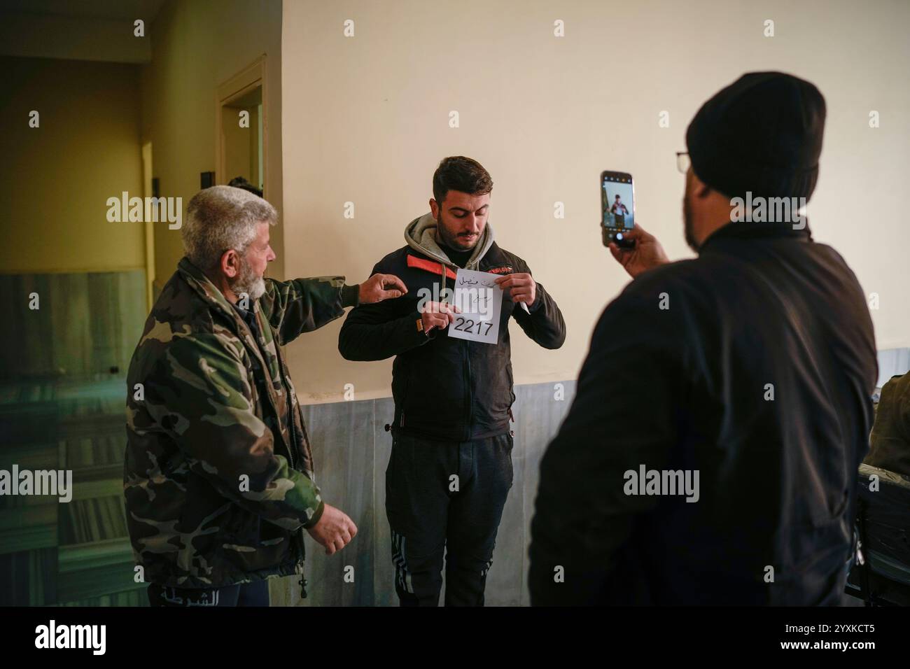 A former soldier of Bashar Assad's Syrian army period registers with ...