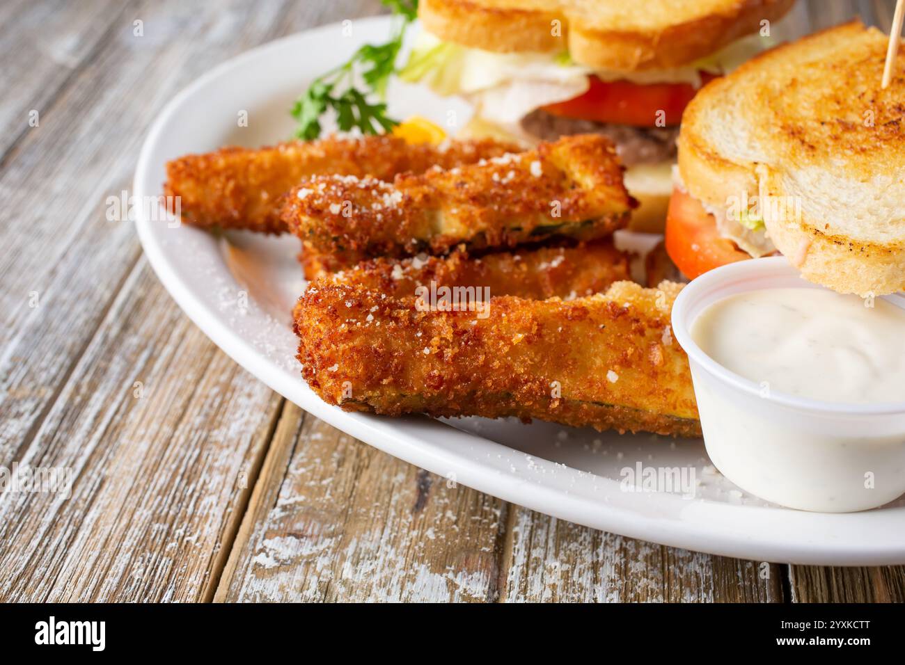 A view of a portion of deep fried zucchini sticks, part of a prepared ...