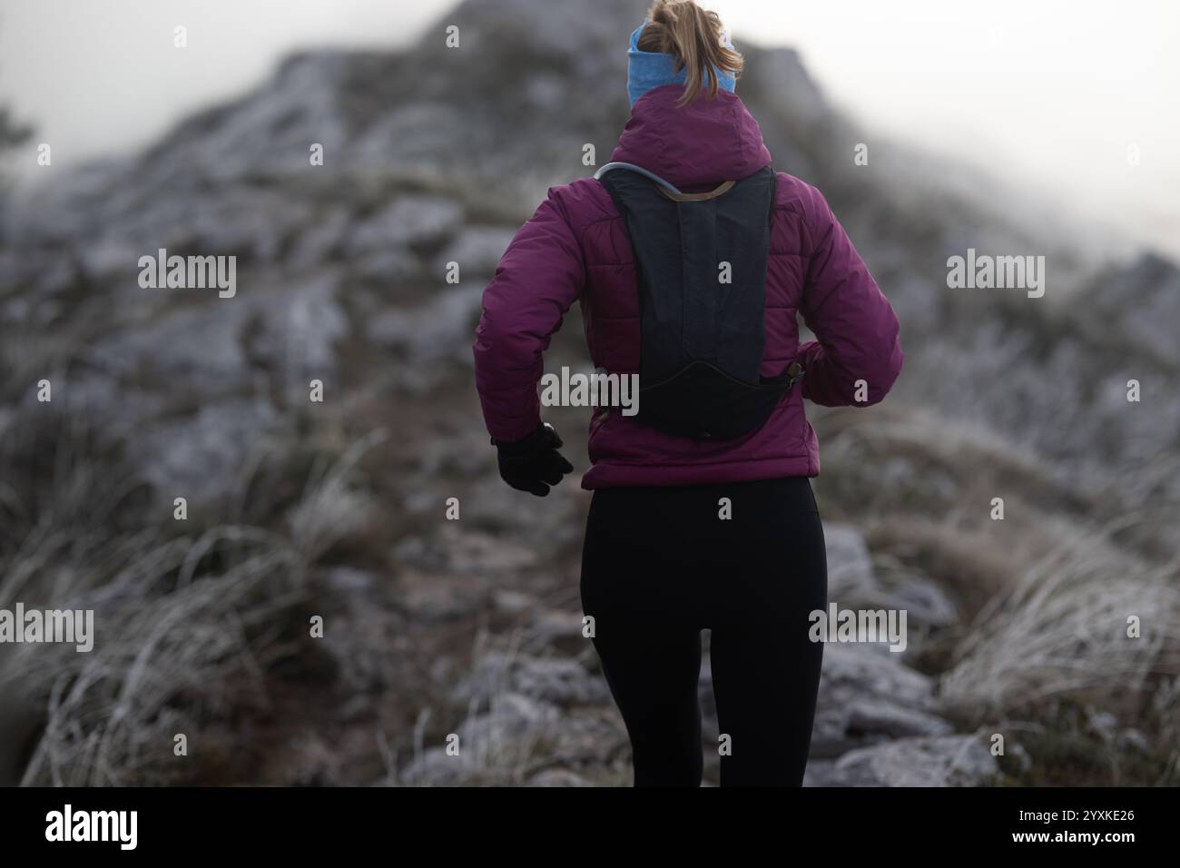 trail running woman athlete training for ultra-marathon race in a ...