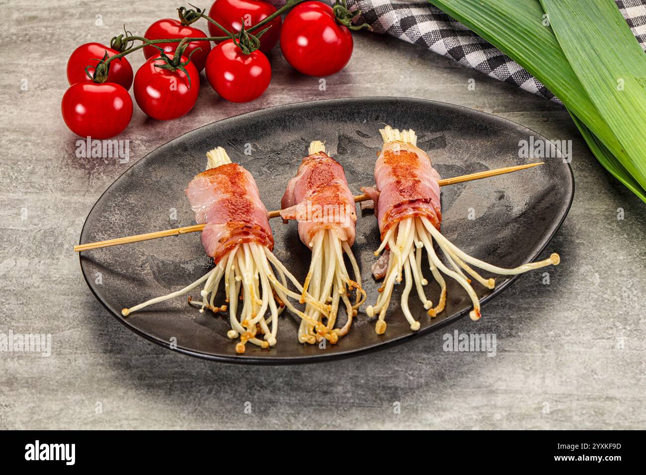 Grilled enoki mushroom with bacon roll wrap Stock Photo - Alamy