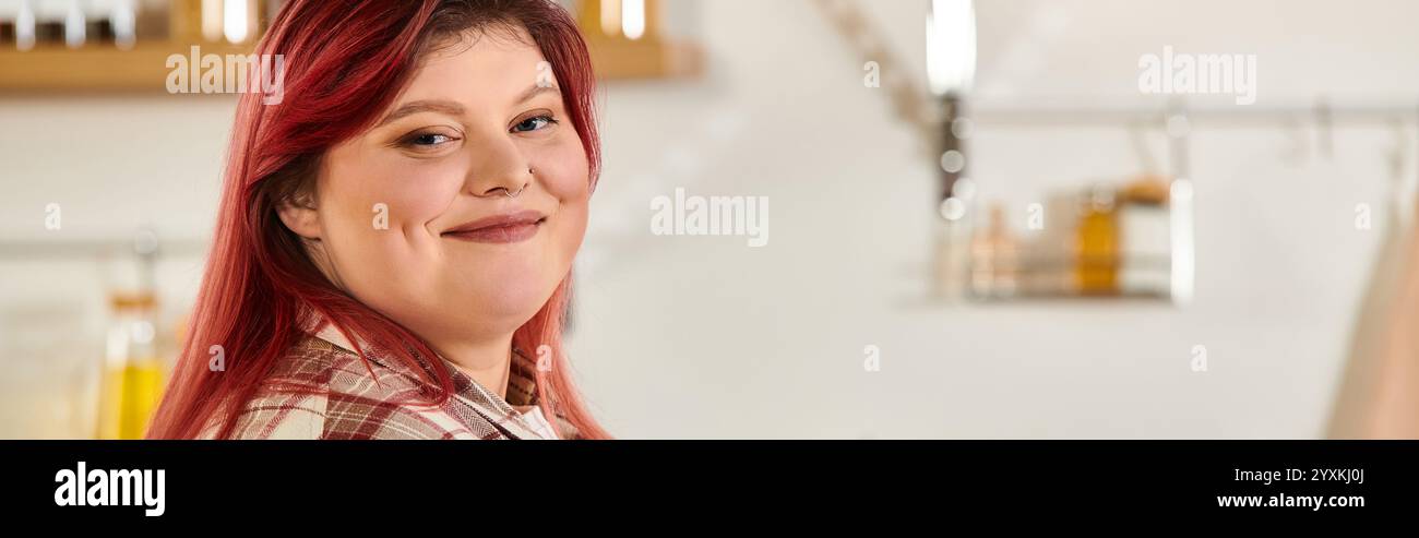 Plus size woman smiles confidently while preparing a meal in a vibrant ...