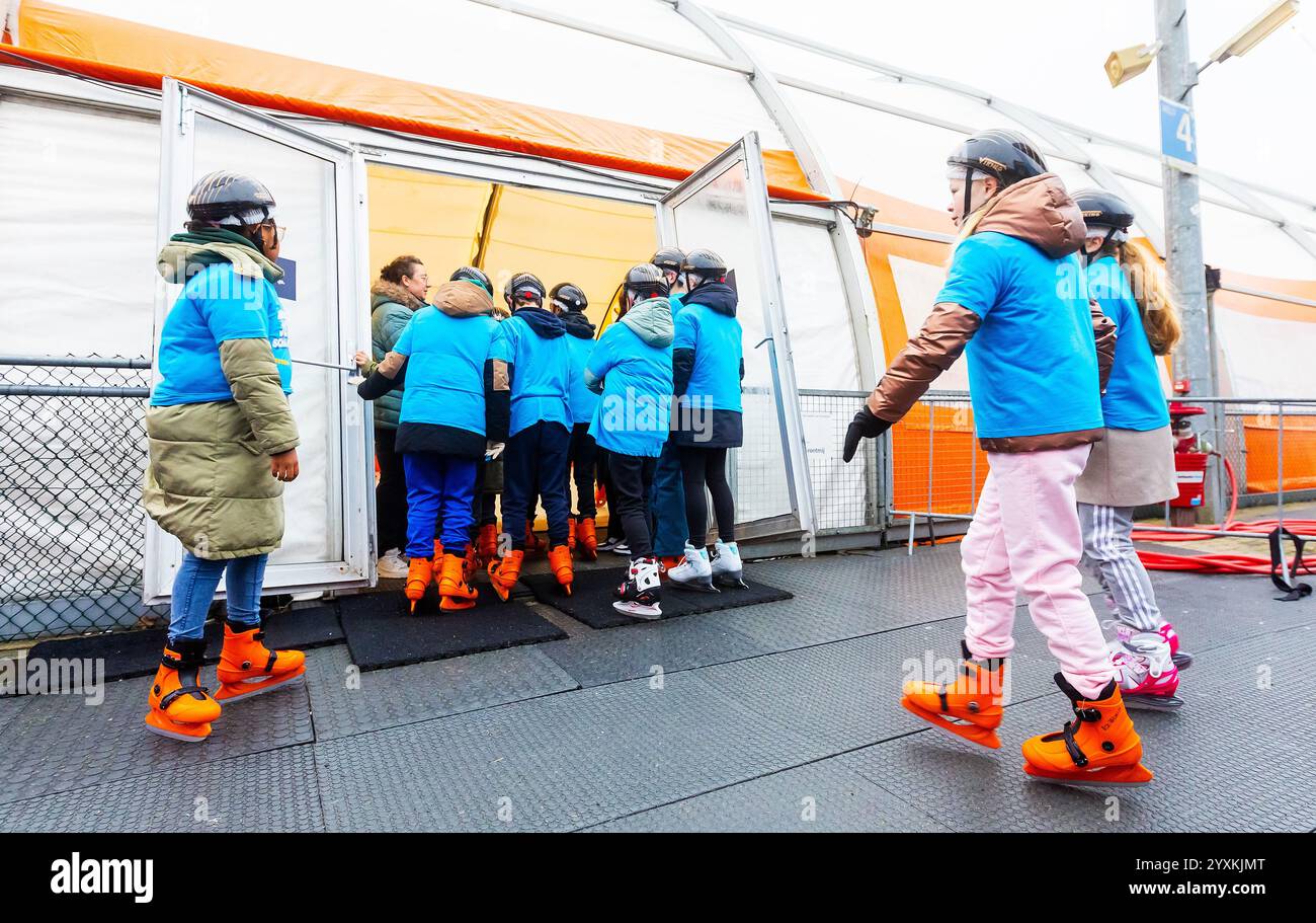 ROTTERDAM - Children take to the ice rink for a world record attempt ...