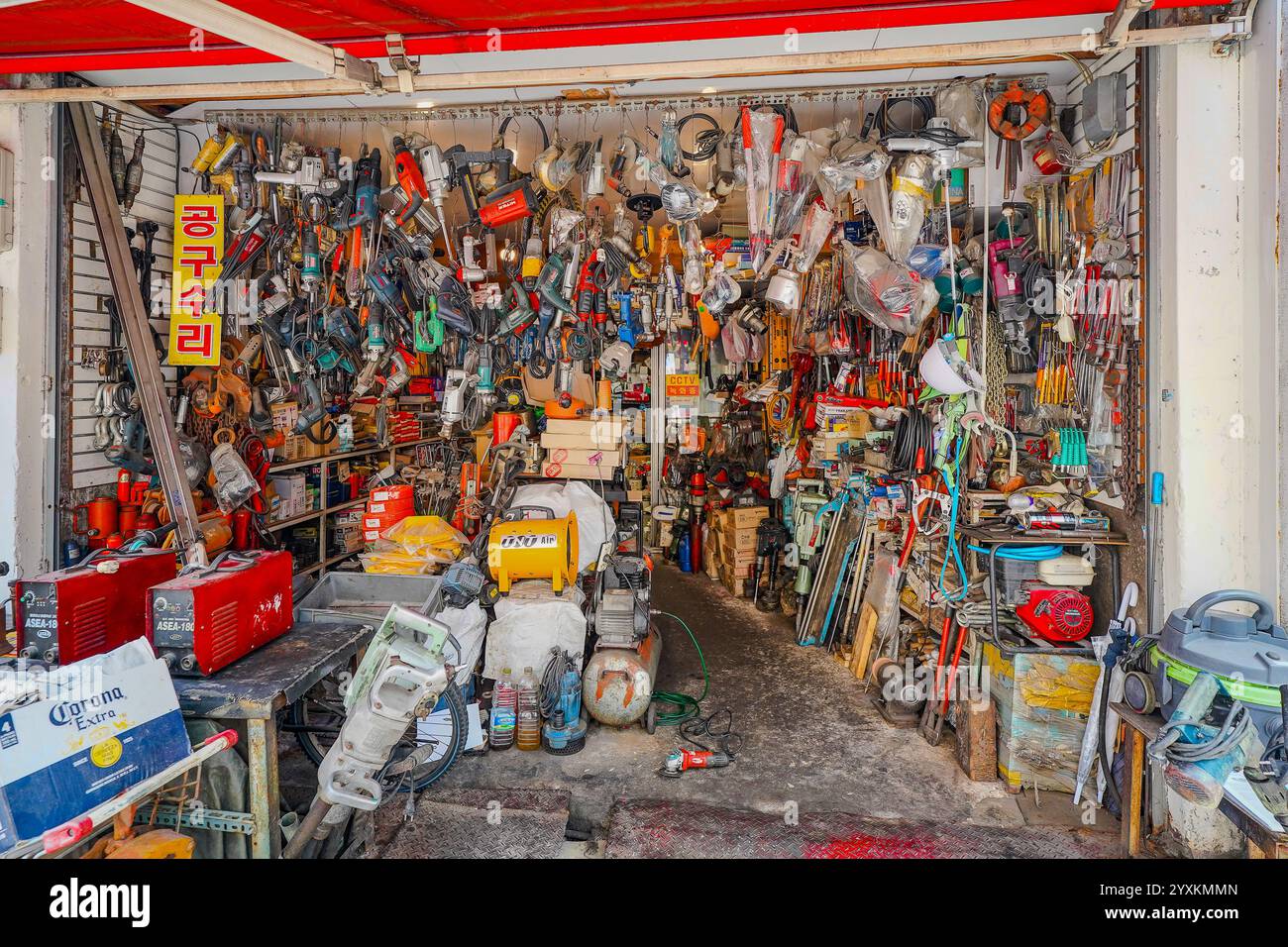 An interior view of a hardware store packed with various tools and ...