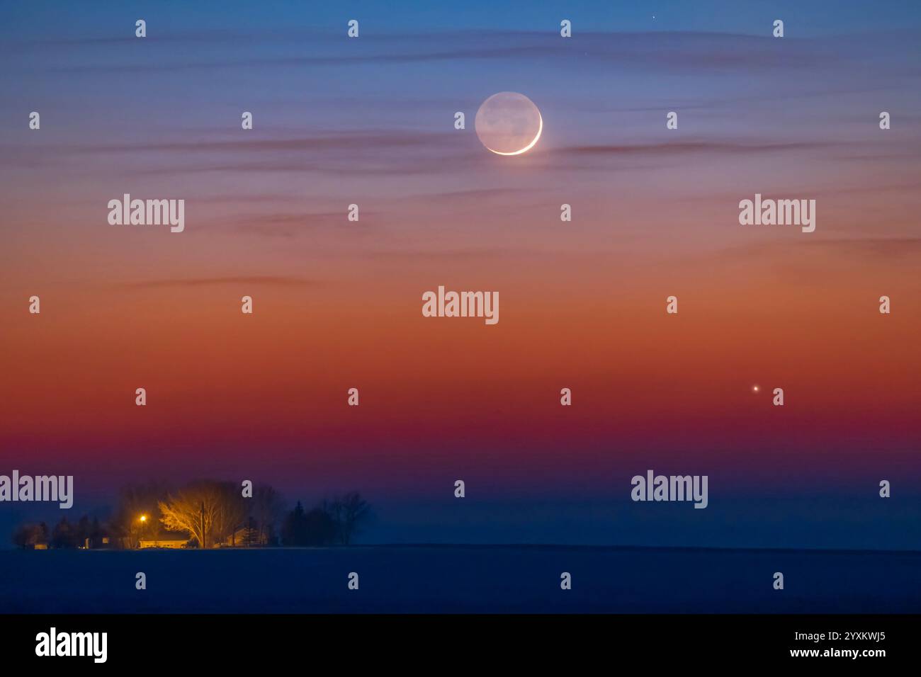 The thin one-day-old crescent Moon just above Jupiter, Alberta, Canada ...