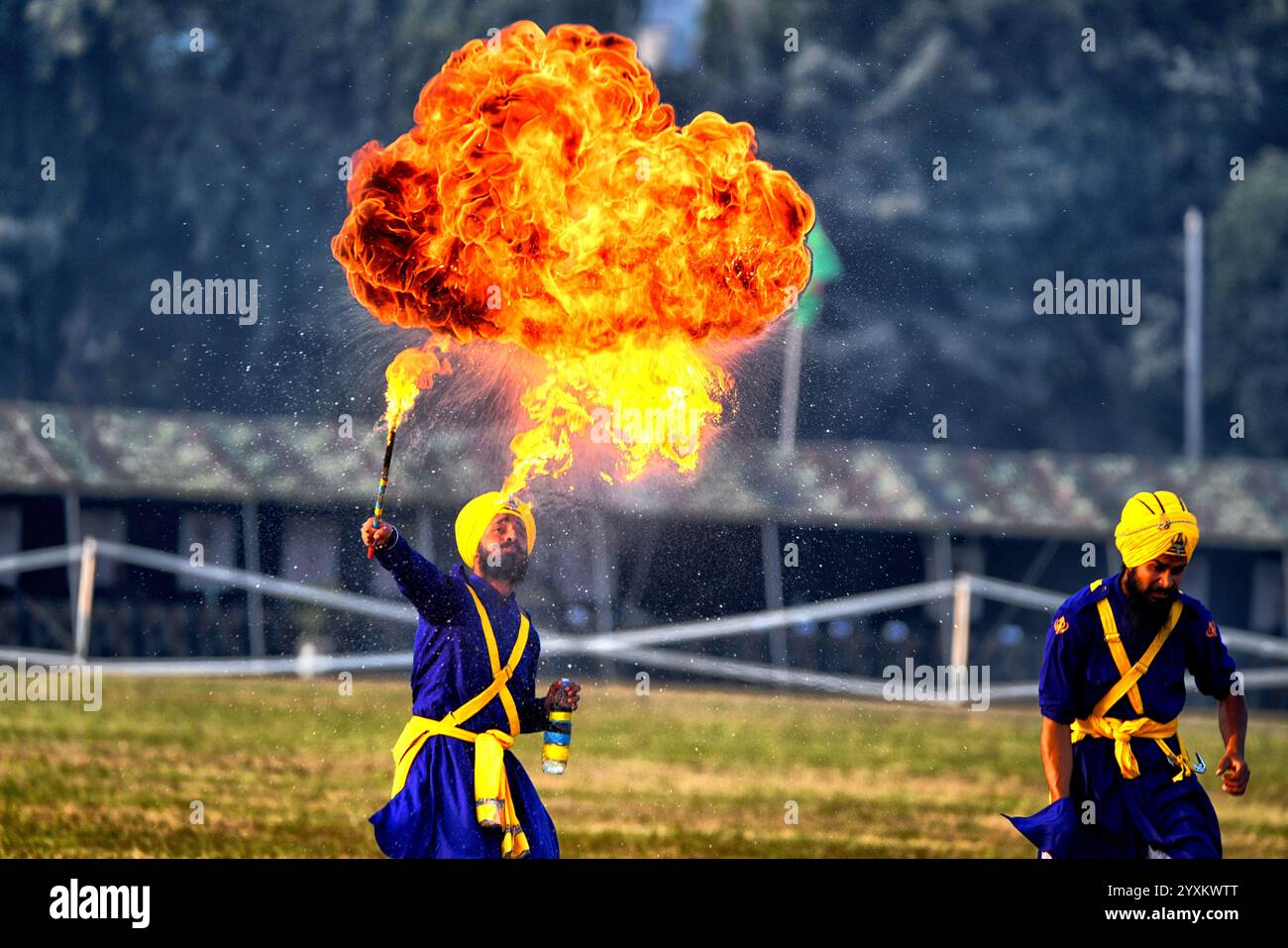 Kolkata, India. 16th Dec, 2024. Soldiers perform stunts with Fire ...