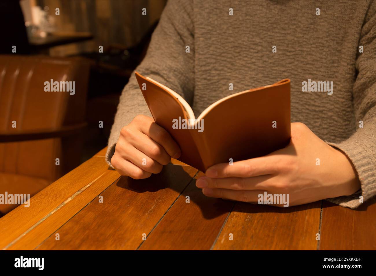 People reading in café Stock Photo - Alamy