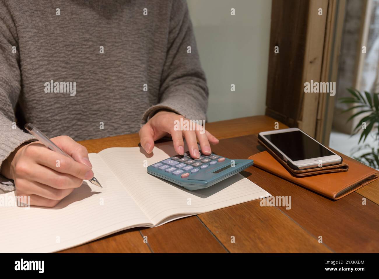 Doing calculations hi-res stock photography and images - Alamy