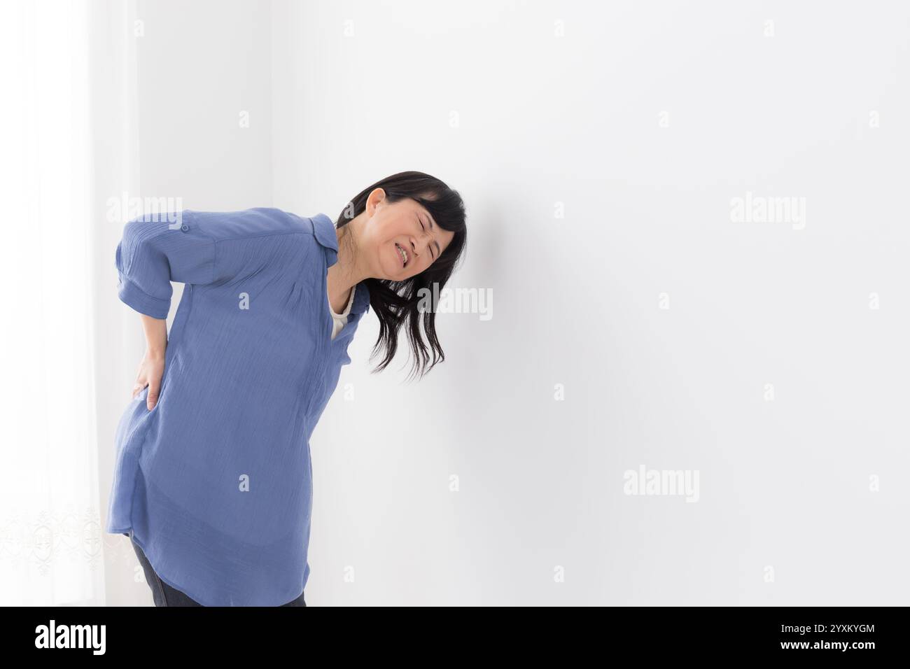Senior woman low back hi-res stock photography and images - Alamy