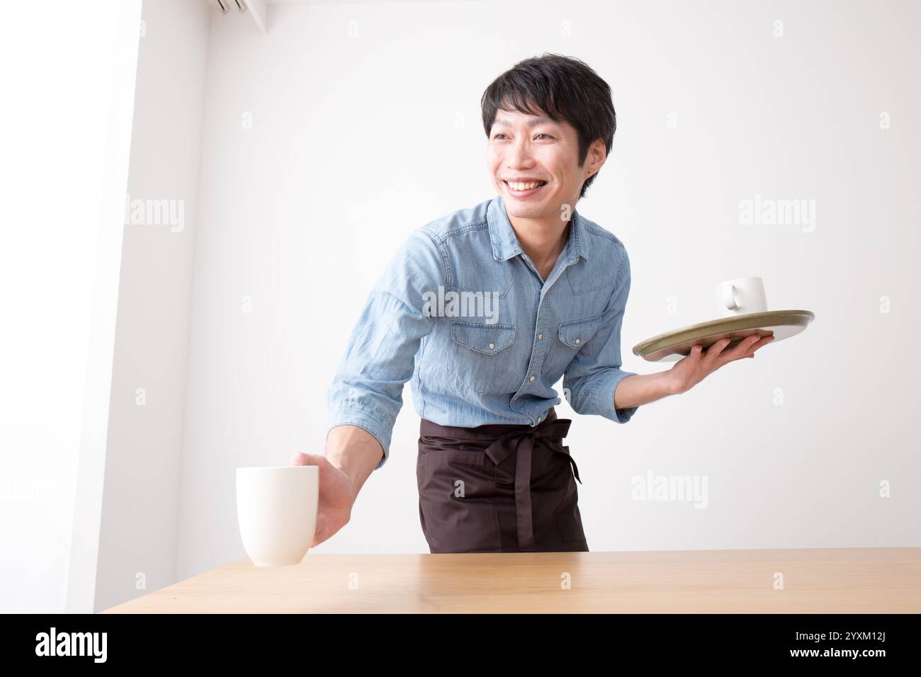 Young japanese man cafe hi-res stock photography and images - Alamy