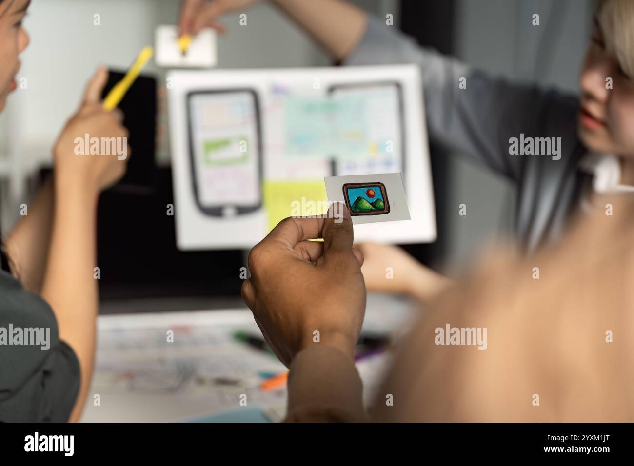Creative UX UI Design Team Collaborating on Innovative Mobile App ...